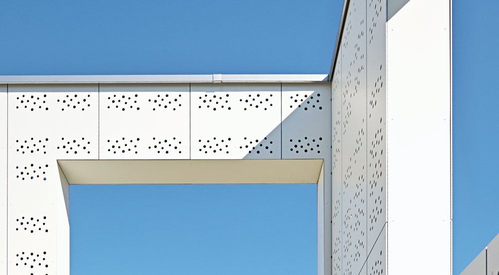 Gallery of Fiber Cement Cladding Panels in Patio Building - 3