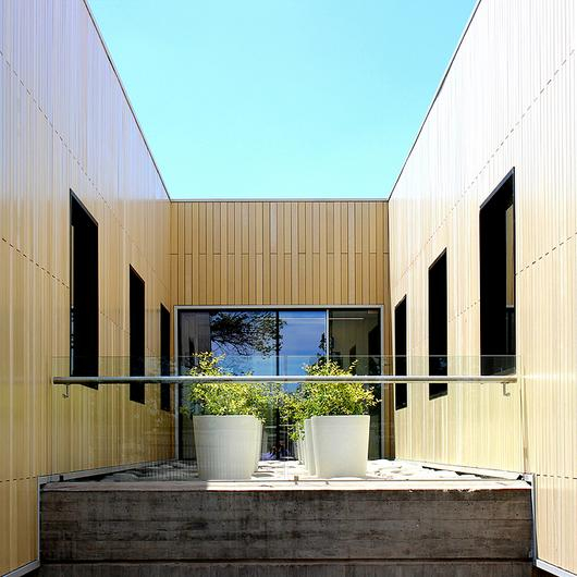Galeria de Fachadas sustentables de fibra de madera acetilada - 6