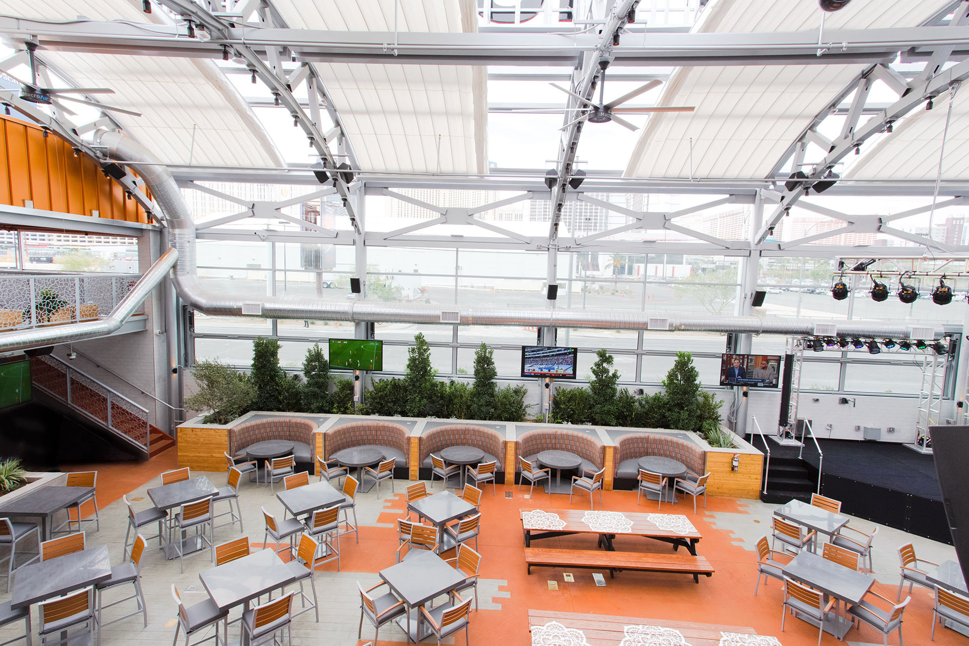 Gallery of Arched Retractable Canopies - The Front Yard at Ellis Island - 5