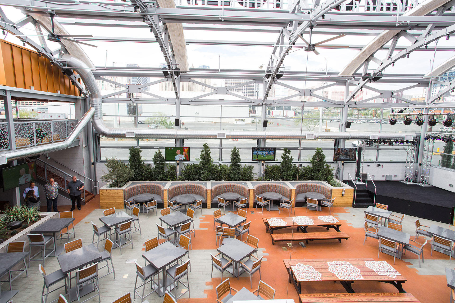 Gallery of Arched Retractable Canopies - The Front Yard at Ellis Island - 6