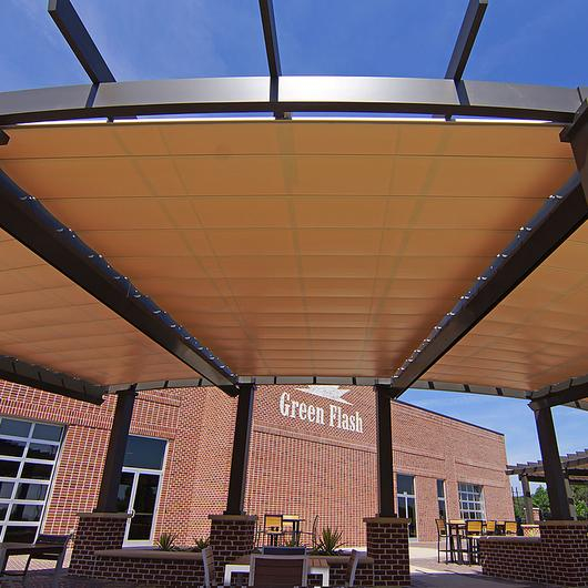 Gallery of Circular Retractable Canopies at Green Flash Brewing Co. - 5