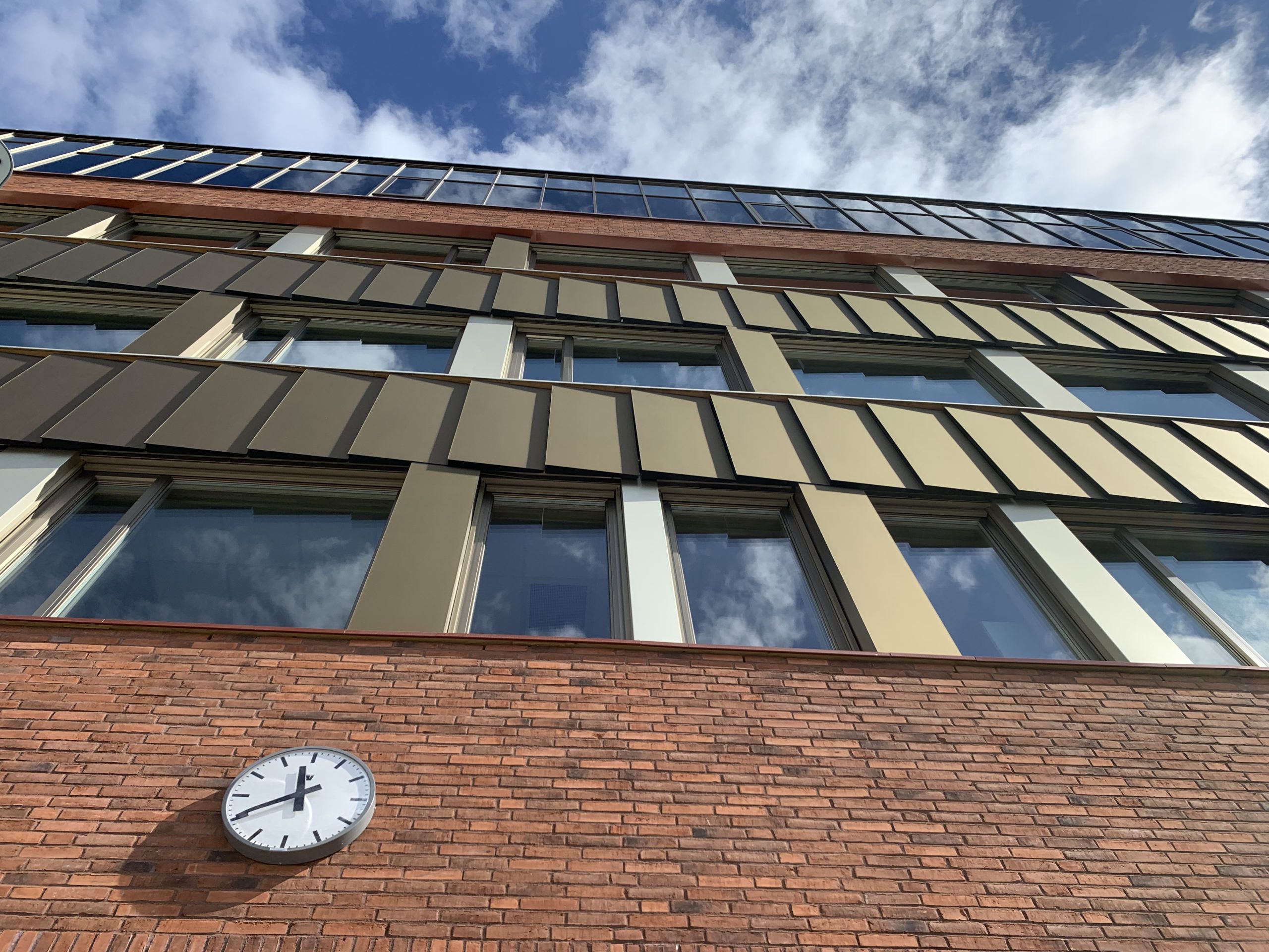 Gallery of Custom Solar Facades - Shingles - 11