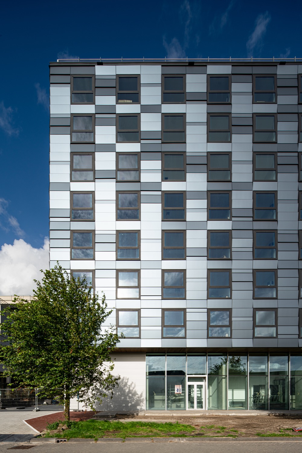 Gallery of Custom Solar Facades - Shingles - 8