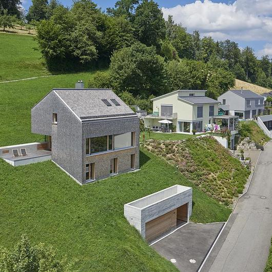 Gallery of Roof Window in Swiss Family House - 4