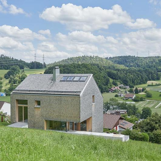 Gallery of Roof Window in Swiss Family House - 5