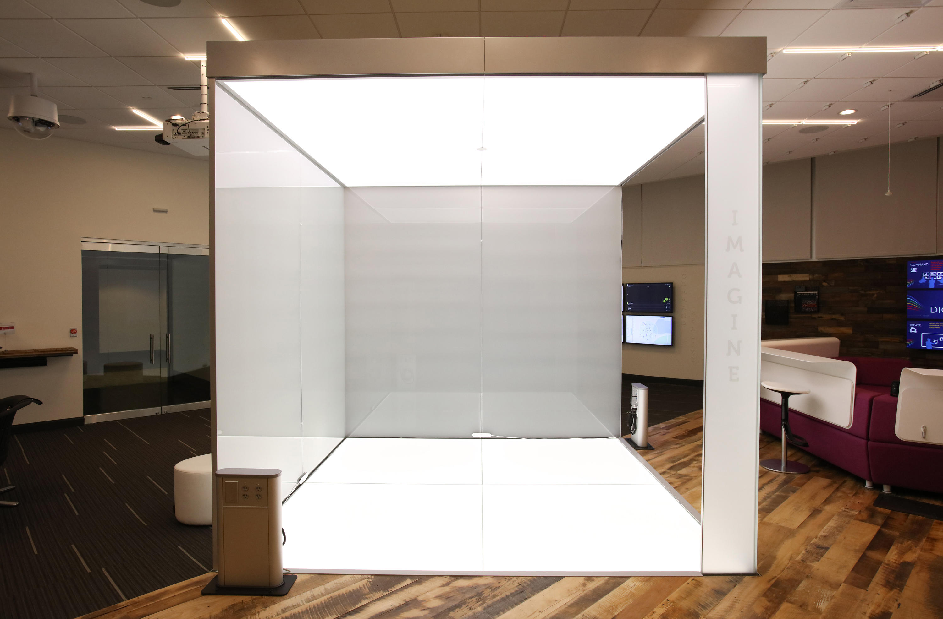 Gallery of Glass Video Panels in Dell Cube - 1