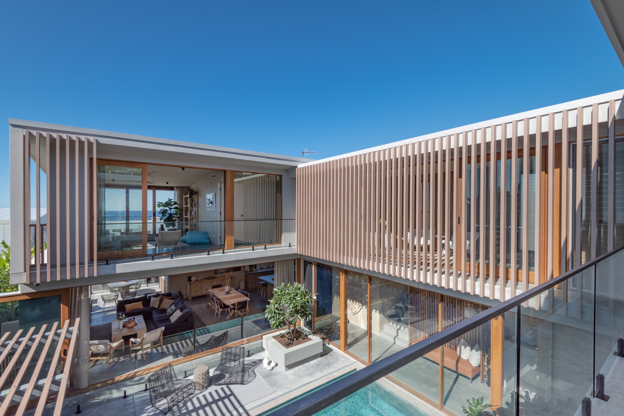 Gallery of Architectural Battens and Aluminum Decking in Private Home - 3