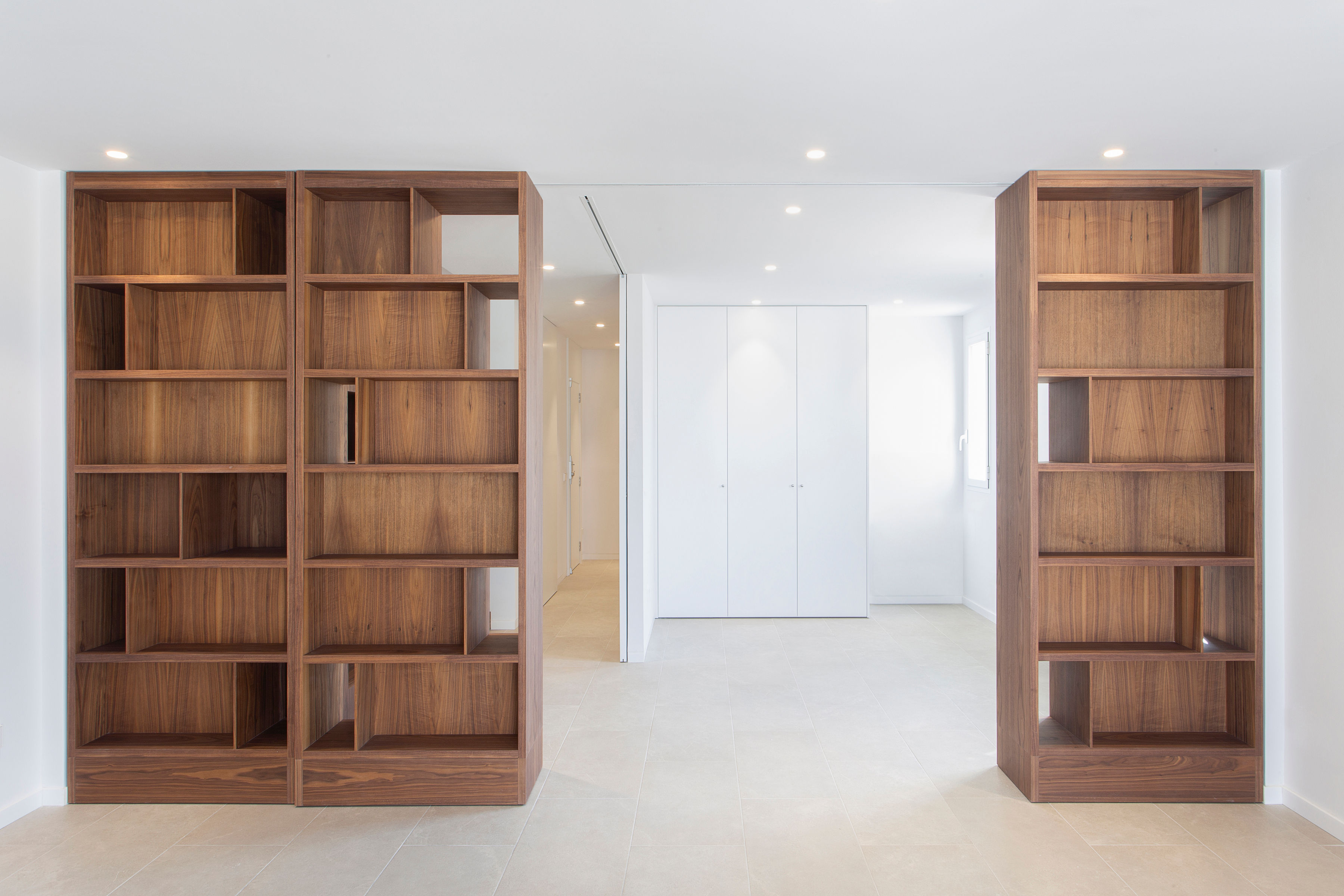 Gallery of Sliding Shelving Partitions in the Colonia House - 2