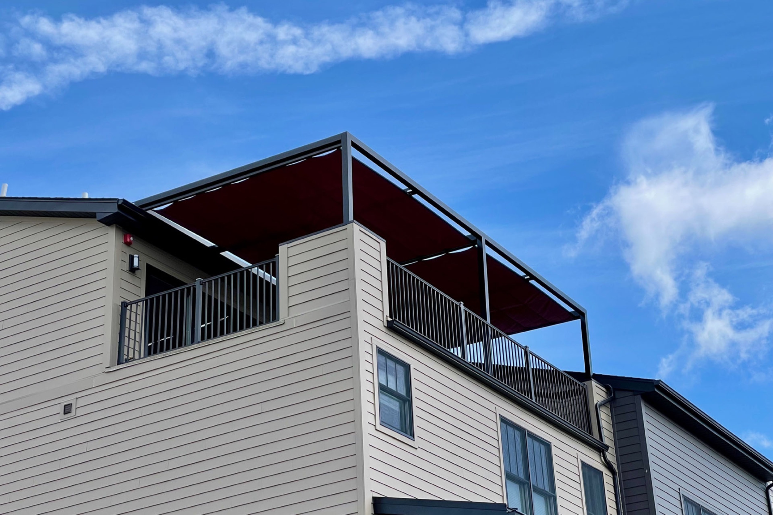 Gallery of Retractable Canopies on a Rooftop Terrace - 4