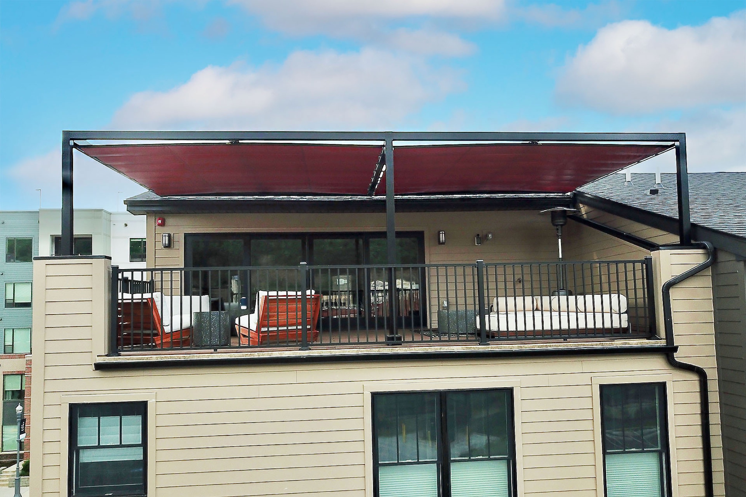 Gallery of Retractable Canopies on a Rooftop Terrace - 6