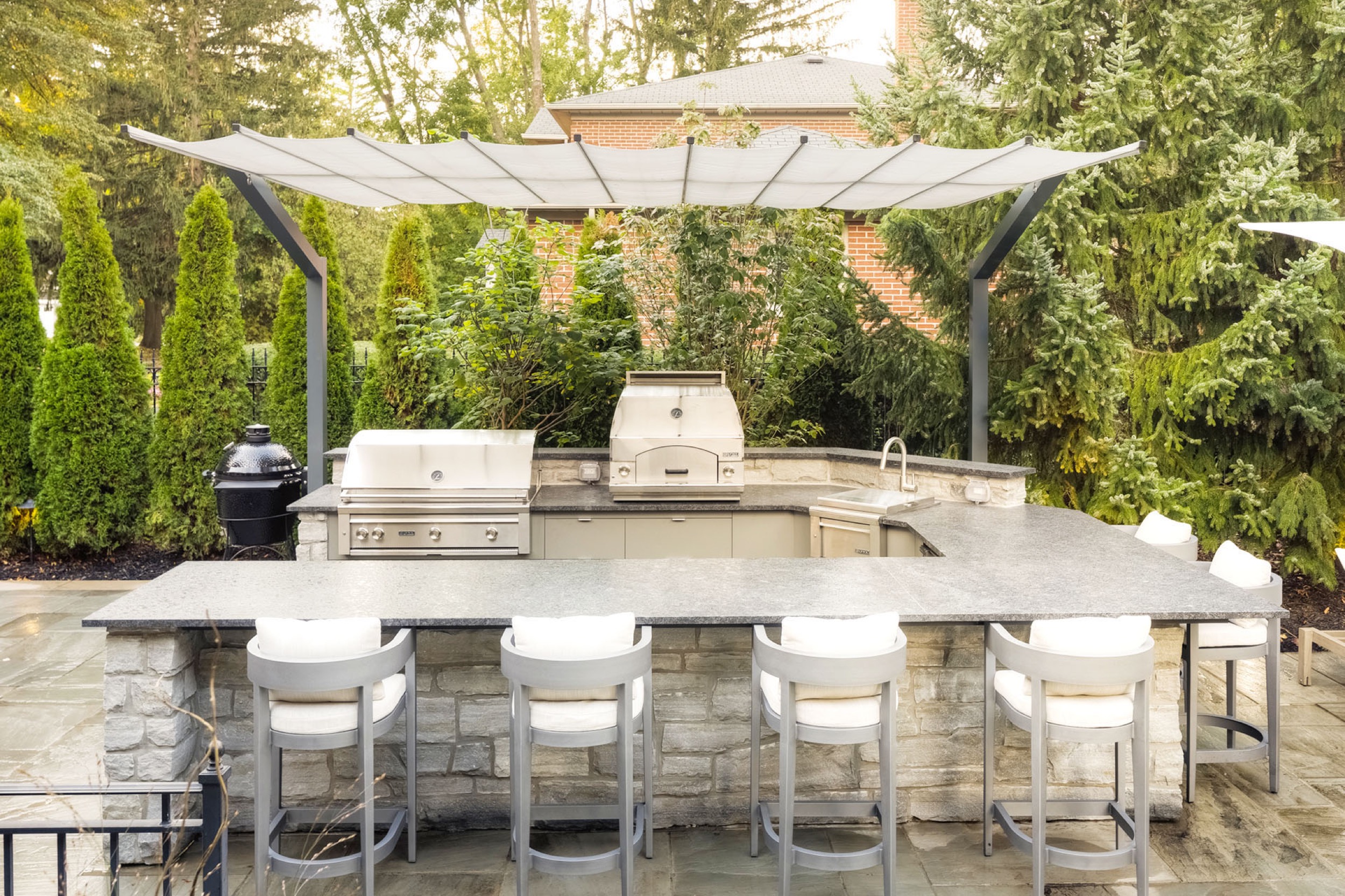 Retractable Canopies in a Backyard in Oakville from ShadeFX