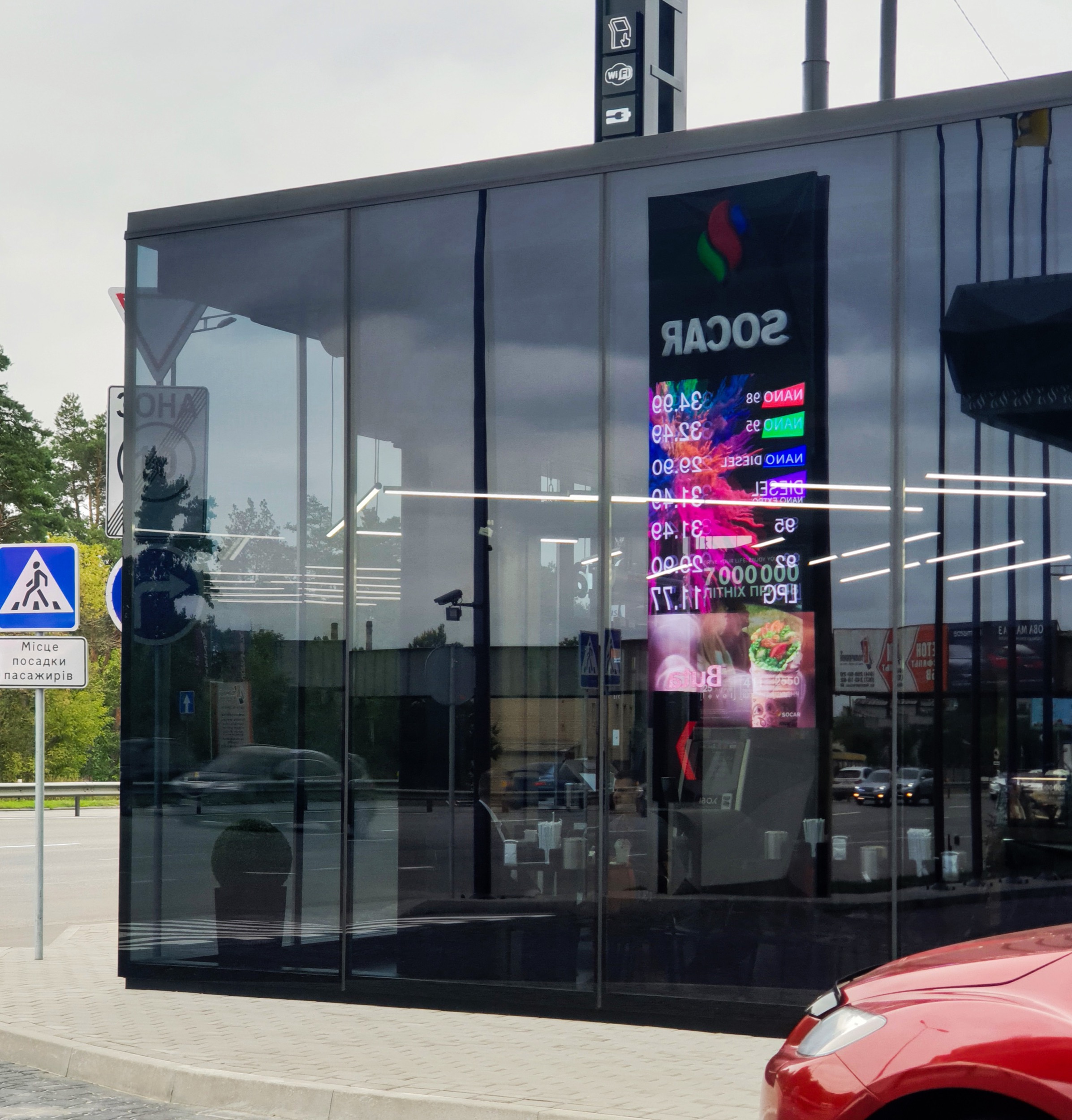 Gallery of Large-format Glass Facades in a Gas Station Chain - 9
