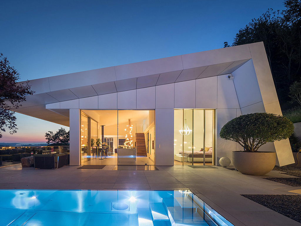 Frameless Sliding Windows in Villa Bern from swissFineLine