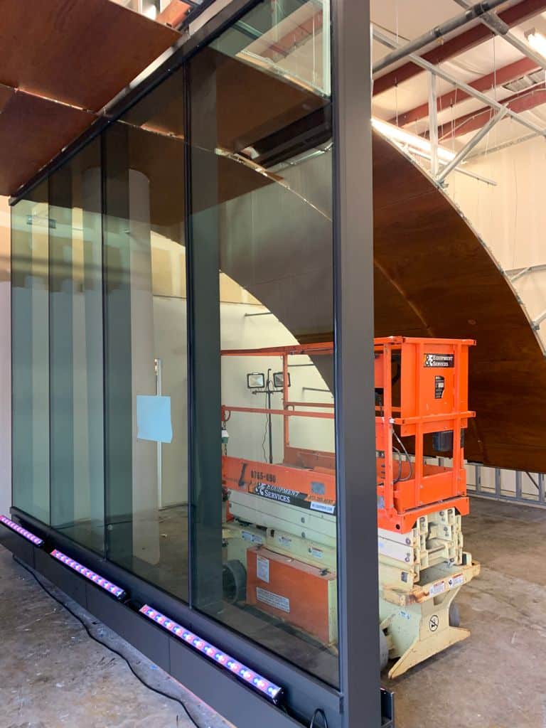 Gallery of Curved Wooden Soffit in the UT Moody Center Arena - 7