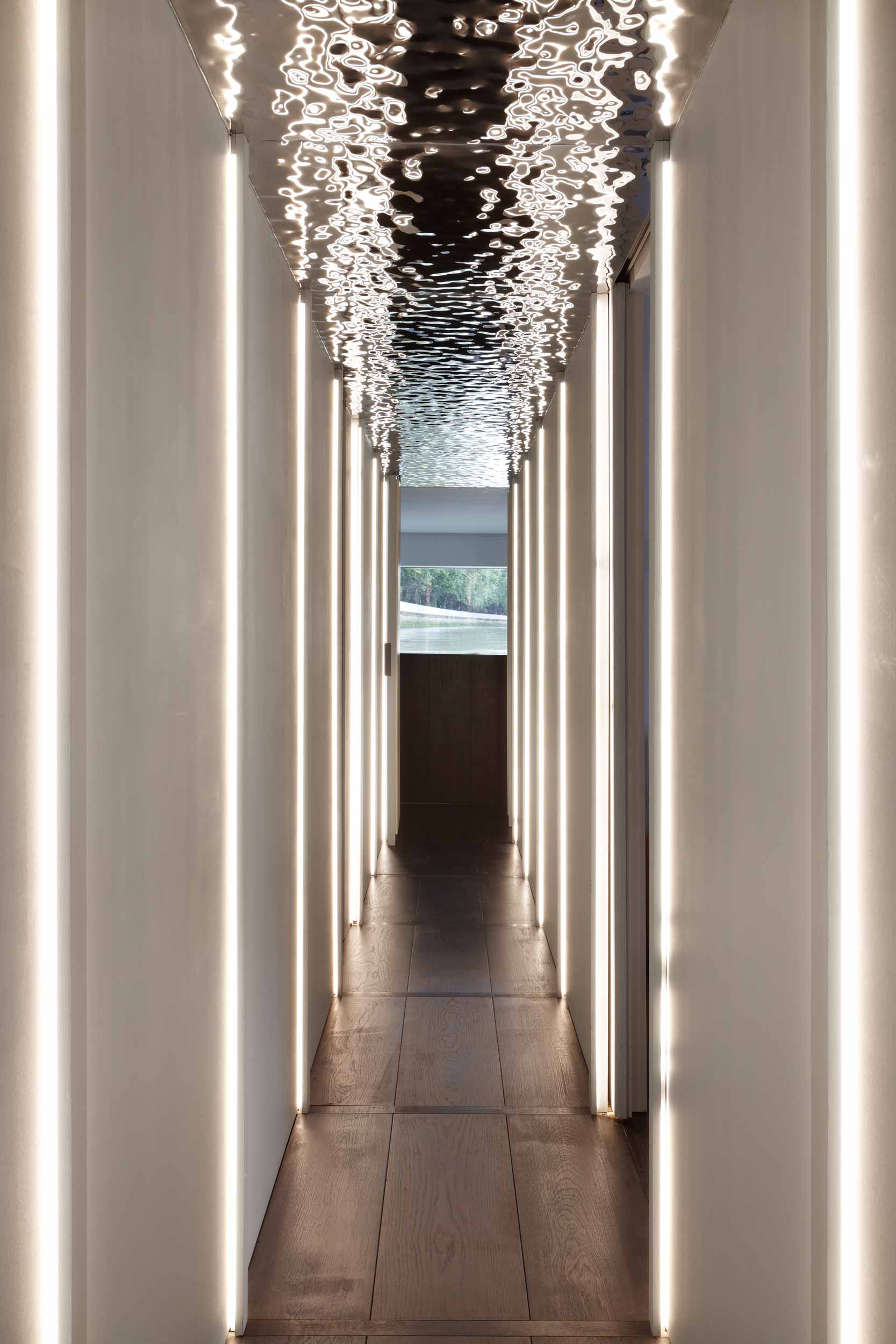 Gallery of Lift & Slide Frameless Windows in Floating Villa - 9