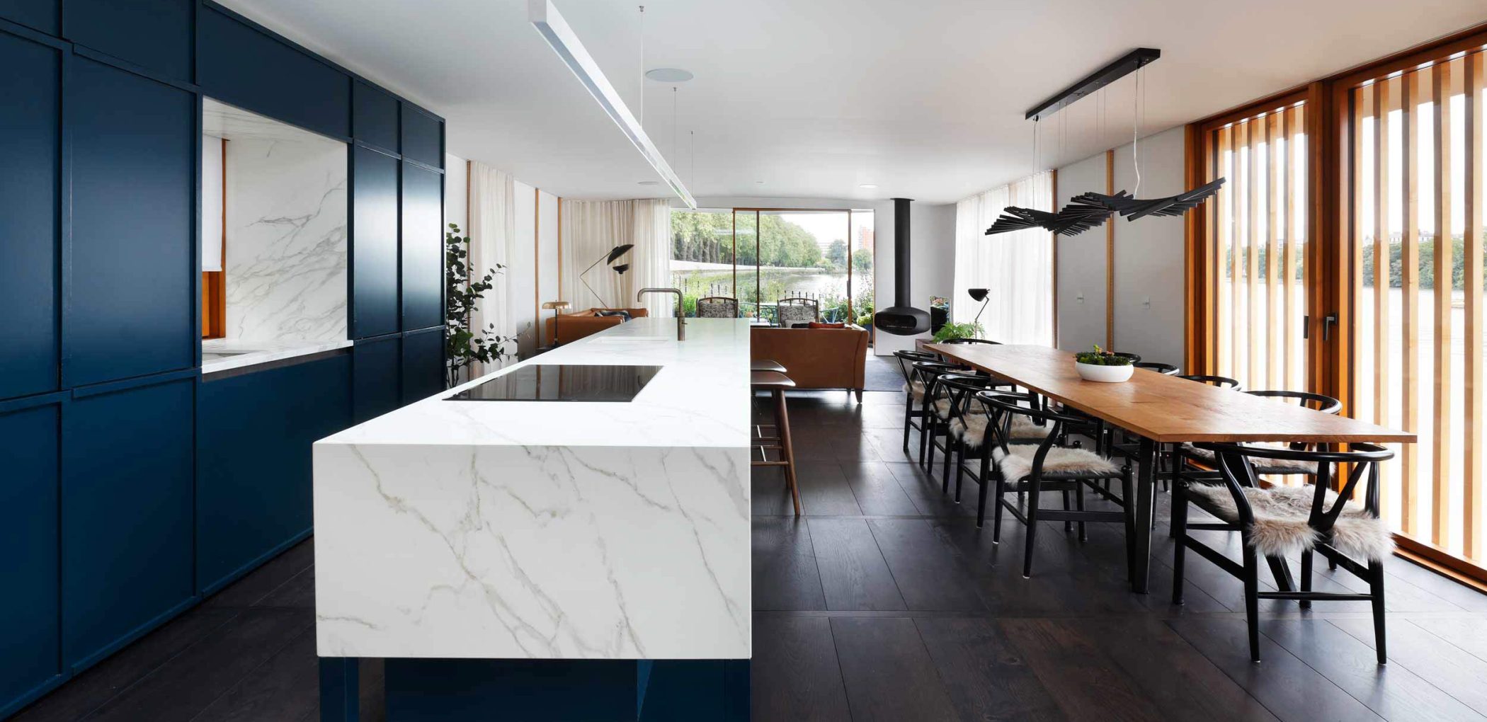 Gallery of Lift & Slide Frameless Windows in Floating Villa - 1