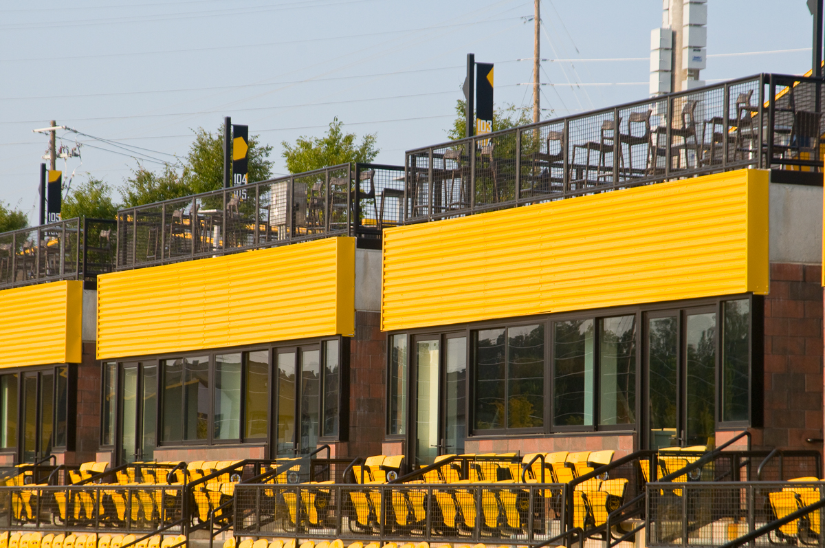 Gallery of Colored Metal Panels at University Stadium - 5