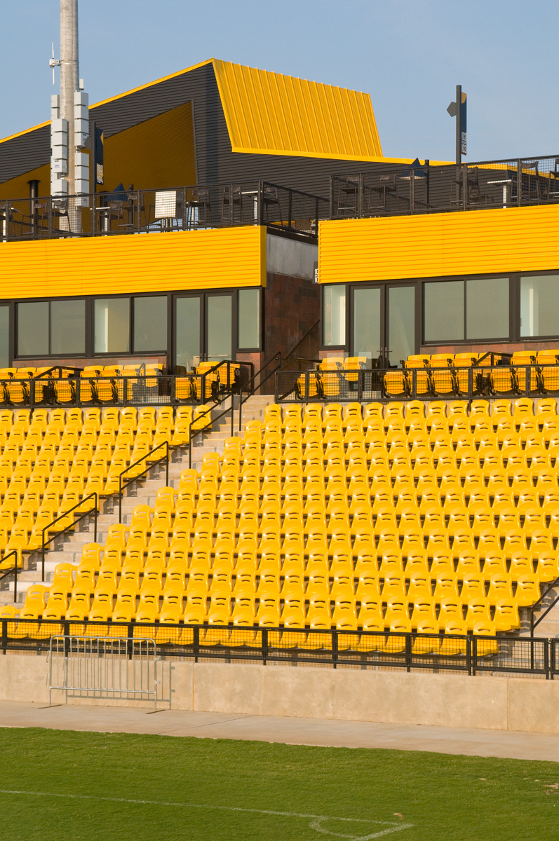 Gallery of Colored Metal Panels at University Stadium - 2