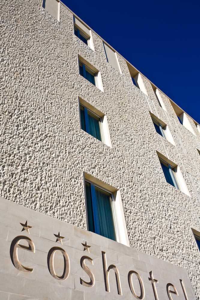 Gallery of Limestone Cladding at Eos Hotel - 4
