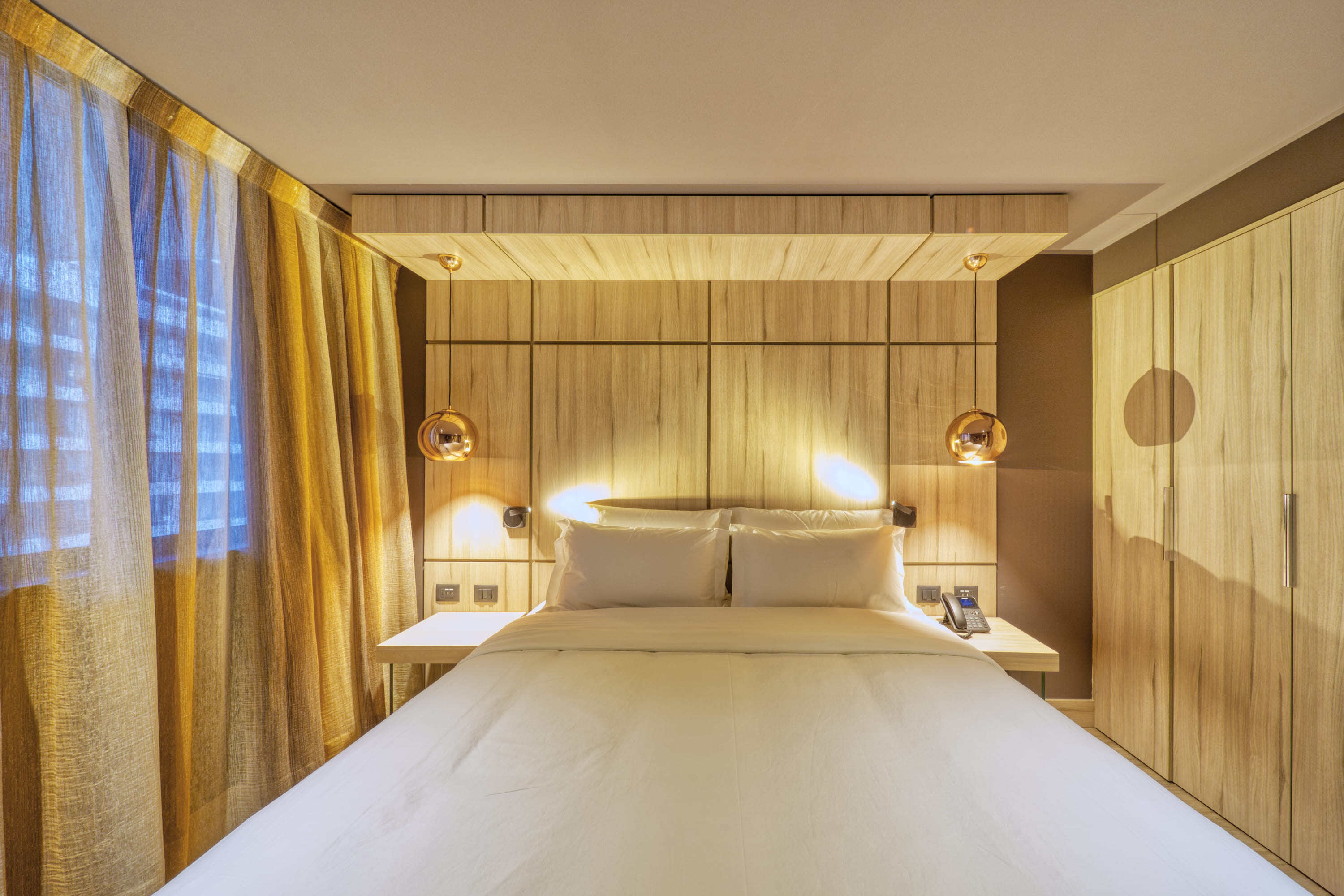 Tablero de Melamina Nogal Ceniza en Hotel One NK de Masisa®